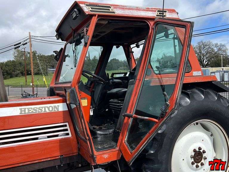1990 Hesston 100-90 Diesel 4x4 Tractor - 777 Auction Company