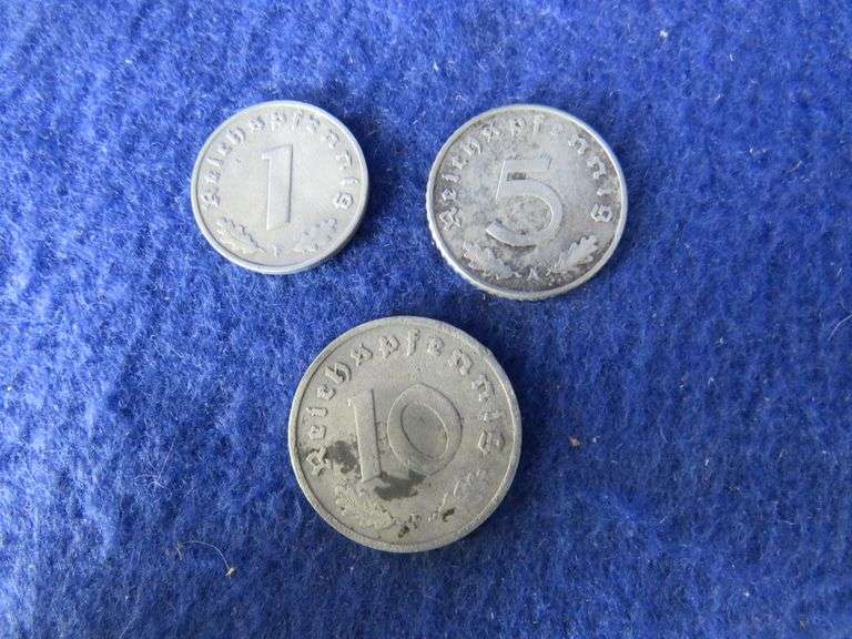 Three WW2 German coins and Adolf Hitler pendant. - AAA Auction and Realty