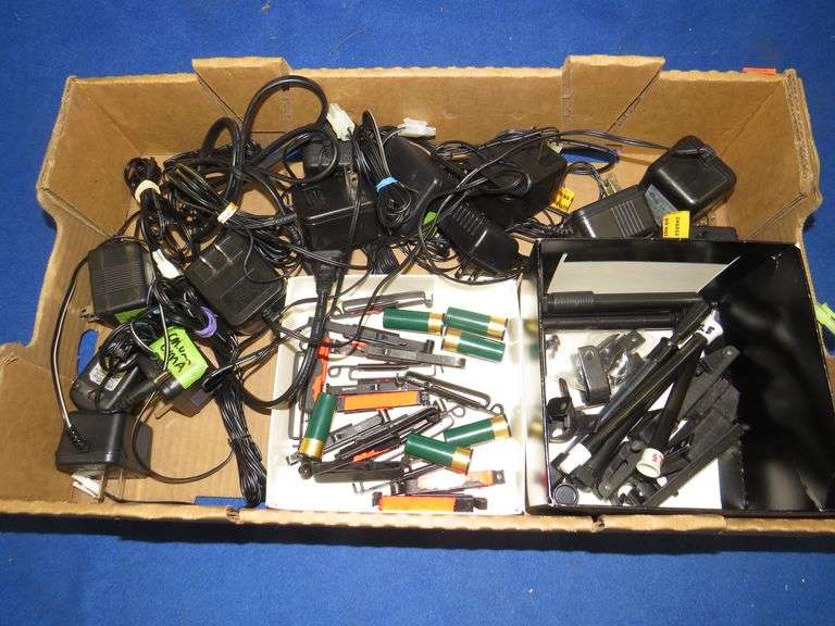 Molle clips, airsoft speed loaders, and charging cords - AAA Auction ...