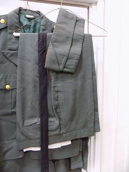 Two army uniforms. One is labeled 42L. They came from the same estate ...