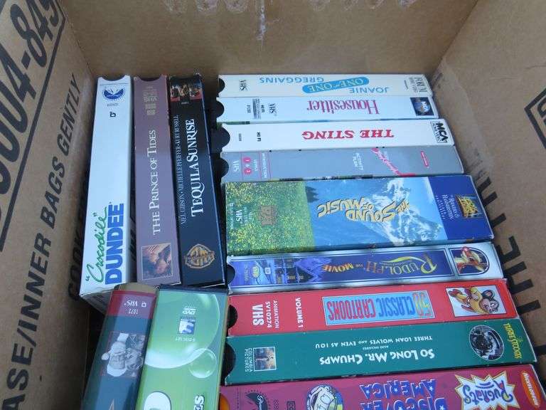 Lots of VHS tapes - AAA Auction and Realty