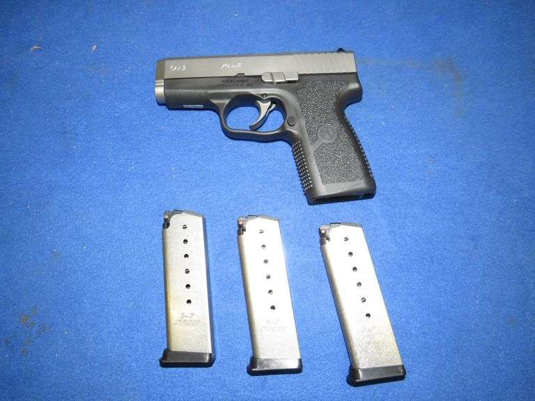 Kahr CW9 9 X 19 semi-auto pistol. SN EM7645. Includes three magazines ...