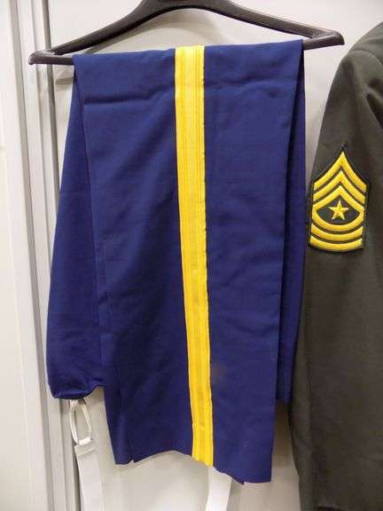 Two army uniforms. One is labeled 42L. They came from the same estate ...