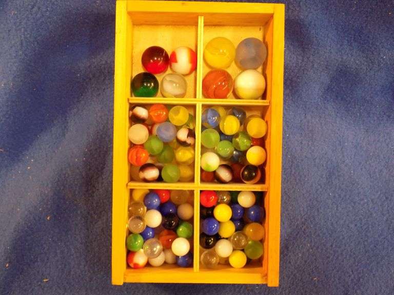 Box of marbles - AAA Auction and Realty