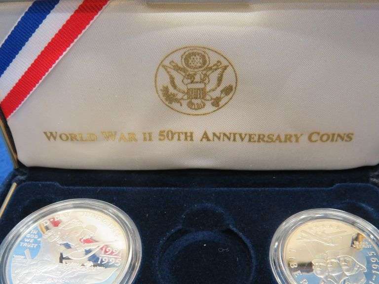World War II Anniversary coin set. Includes 90% silver dollar coin ...