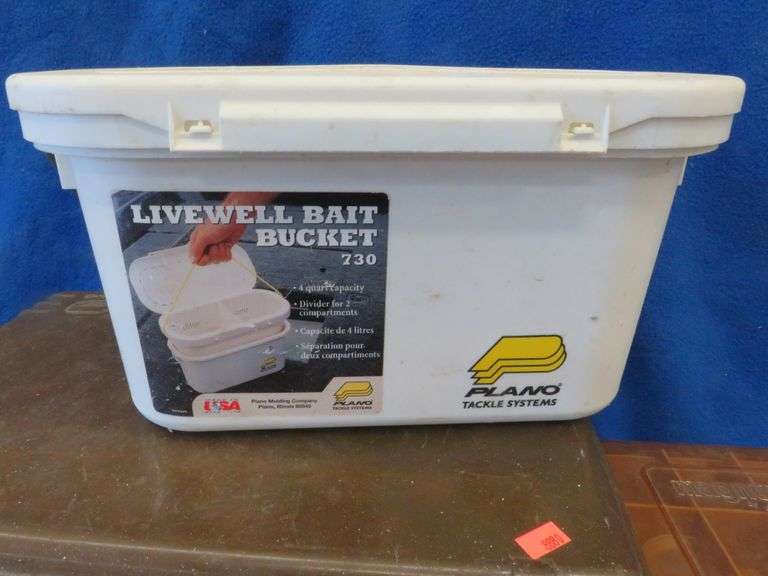 Two Plano tackle boxes with a some tackle and a livewell bait bucket ...