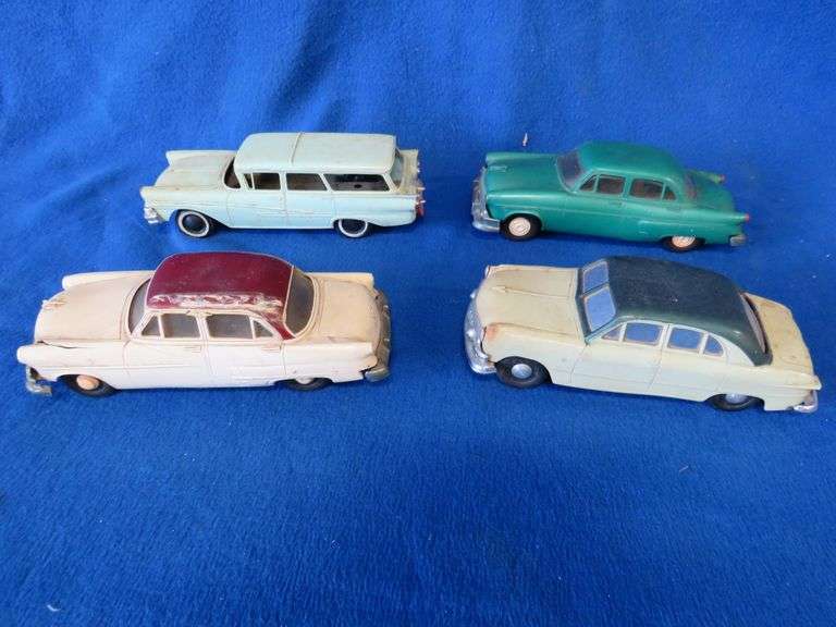 Four vintage model cars - AAA Auction and Realty