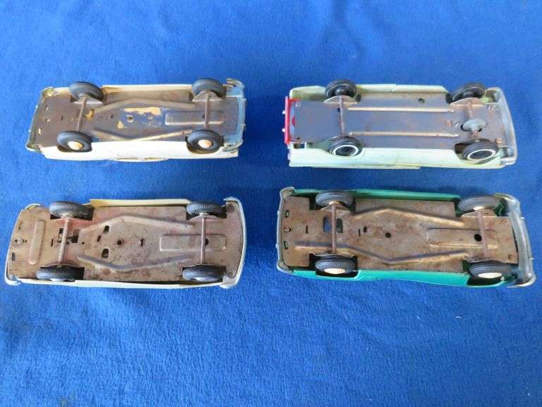 Four vintage model cars - AAA Auction and Realty