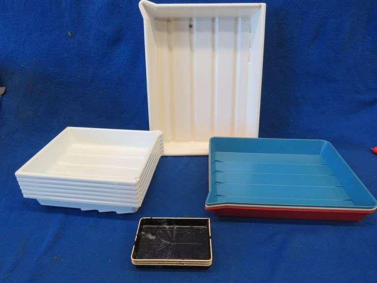 Thirteen film developing trays of different sizes and more. Includes ...