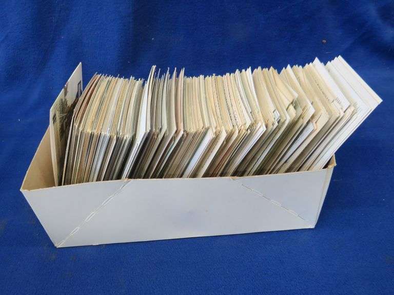 Hundreds of postcards from around the world - AAA Auction and Realty