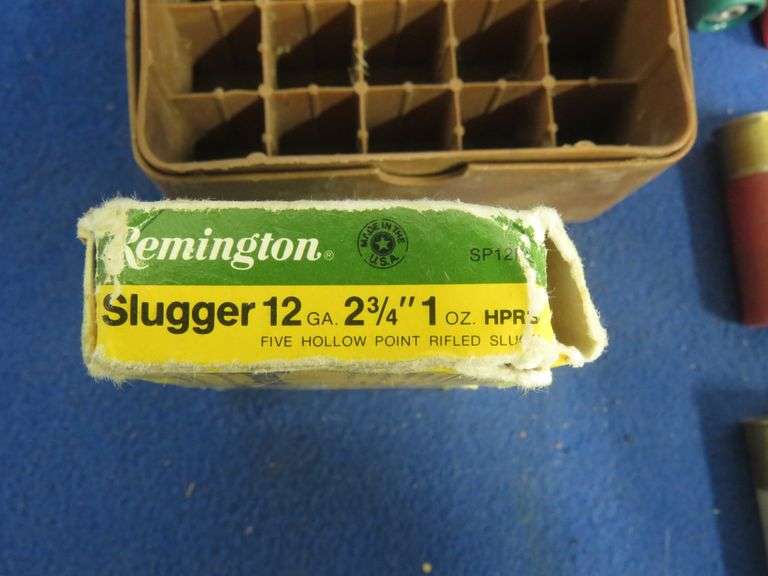 17 - 12 gauge shotgun slugs with a plastic shotgun shell holder - AAA ...