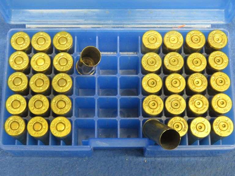 Two unopened bags of 100 ea. .380 Auto shell cassings, 16 empty and ...