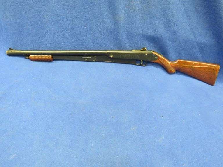 Daisy Model 25 pump-action BB gun with a two-way rear sight. Cocks and ...