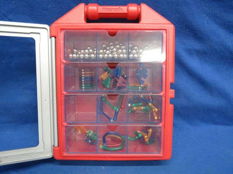 Magnetix toy pieces in a case - AAA Auction and Realty