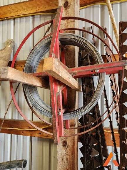 #9 high tensile wire unroller with new roll & partial roll - Ascent Auction