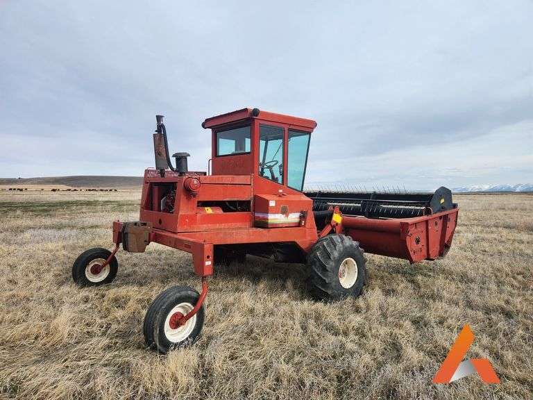 1990 MacDon Sickle Swather, 3616 hours, 14 MacDon header - Ascent Auction