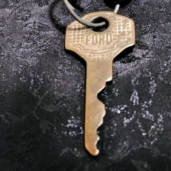 Ford Airplane key marked HURD on one side & Ford on the other; and ring ...