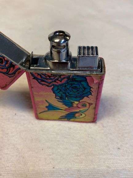 Refillable lighter with what looks like an Ed Hardy design - Lil Dusty ...