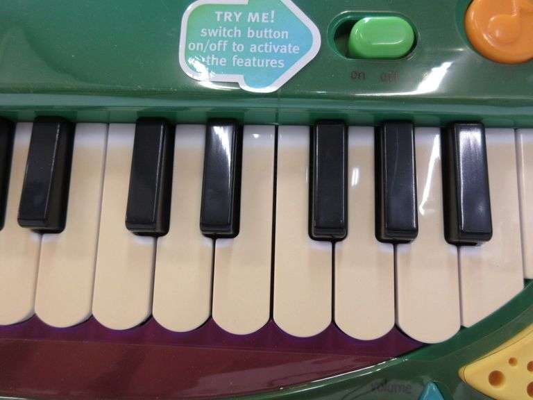 Older Baby Genius DJ's Sing-Along Keyboard - Albrecht Auction Service