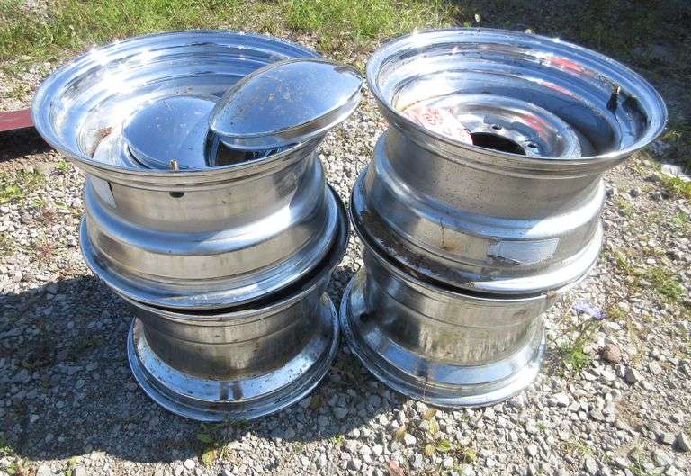 Set of (4) Chevy Six-Bolt Rims on Baby Moon Hubcaps - Albrecht Auction ...