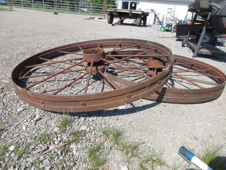 (2) Antique Steel Tractor Wheels - Albrecht Auction Service