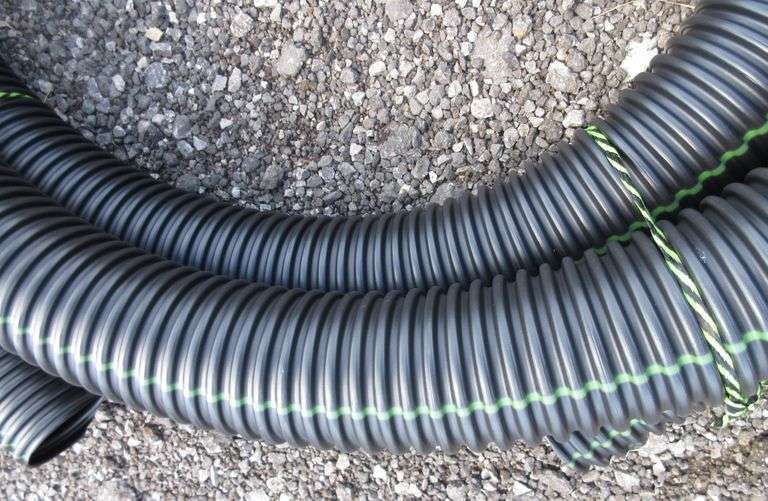 Solid Black Plastic Drain Pipe - Albrecht Auction Service