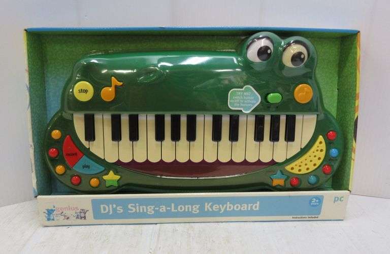 Older Baby Genius DJ's Sing-Along Keyboard - Albrecht Auction Service