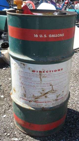 Full 16-Gallon Essentialube Oil Drum - Albrecht Auction Service