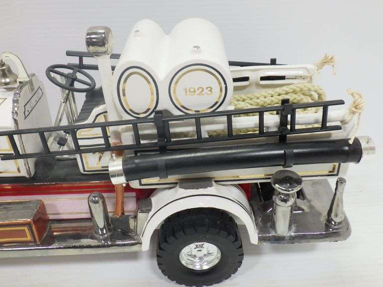 Ceramic fire truck, 18"W x 6"D, has paint loss, piece has been repaired ...