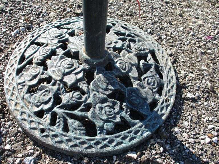 (2) Heavy pipe umbrella stands - Albrecht Auction Service