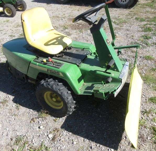 John Deere 525 lawn tractor with snow blade, runs and works very well ...