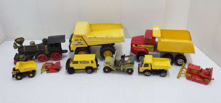 (9) Toy trucks, cars, and trains, includes: Nylint truck, Tonka Trucks ...