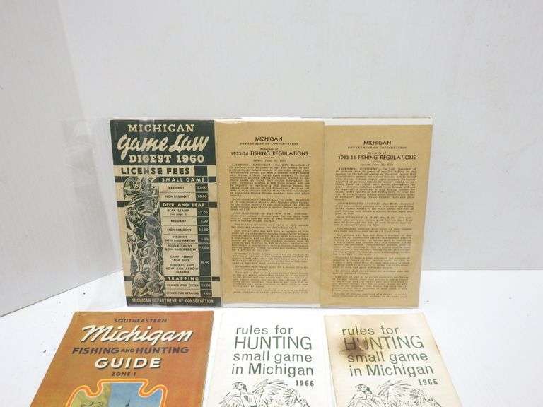 Group of (12) vintage Michigan hunting/fishing maps and game laws ...