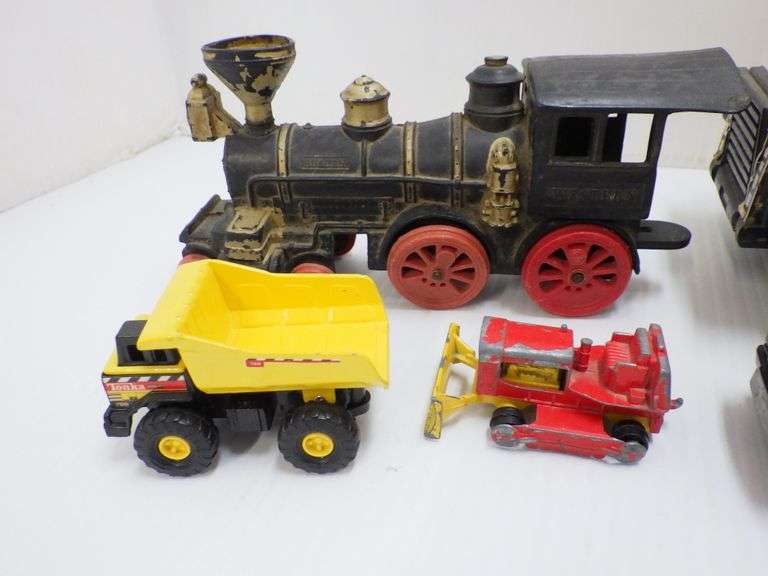 (9) Toy trucks, cars, and trains, includes: Nylint truck, Tonka Trucks ...