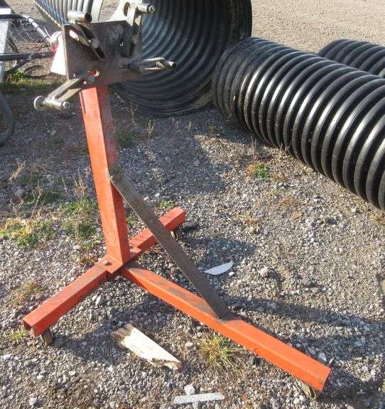 Orange heavy duty metal rolling engine stand, good - Albrecht Auction Service