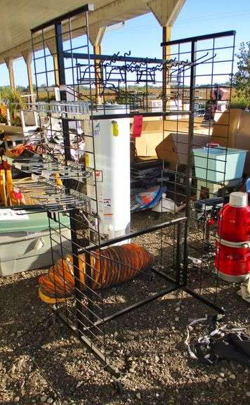 Rolling wire rack, used to store stick tools, shovels, rakes, and more ...