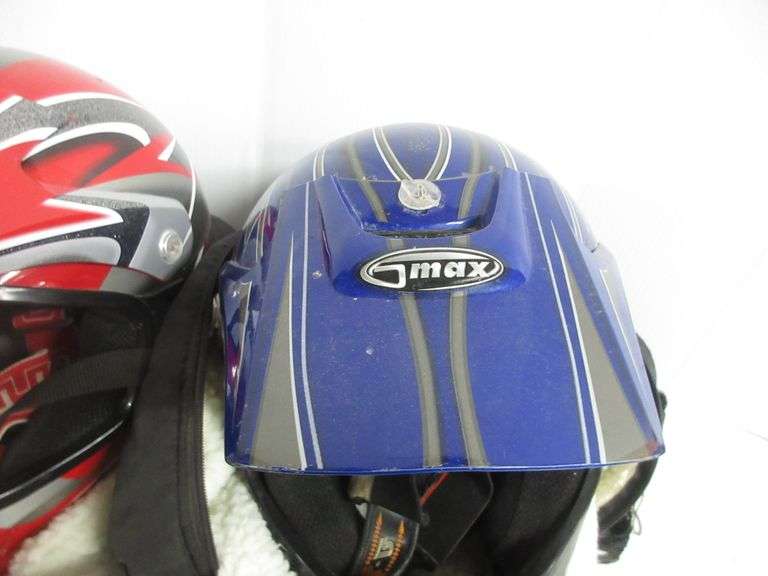 (2) Helmets: Blue Gmax 26X helmet with goggles, gloves, and case; Red ...