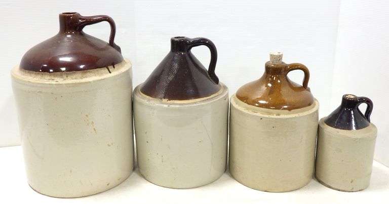 Collection of (4) older crock jugs, some with numbers, all in great ...