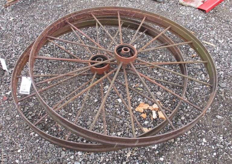 (2) Antique steel wheels, 4'W, good - Albrecht Auction Service