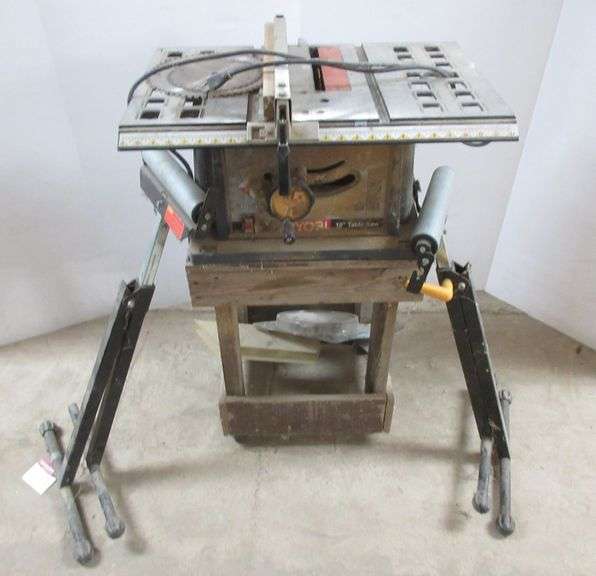 Ryobi 10" table saw on stand with (2) Roller stands and extra blades ...