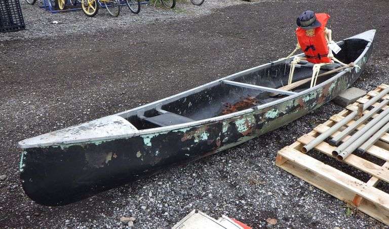 Halloween prop canoe with skeleton, not seaworthy - Albrecht Auction ...