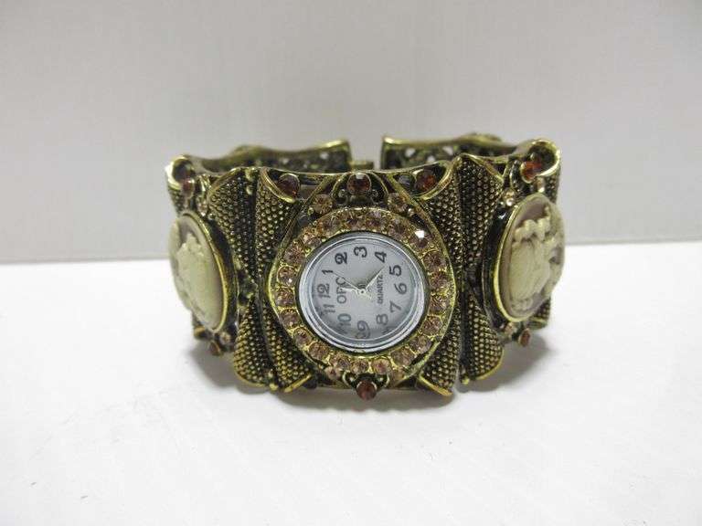 Womens cameo watch/bracelet, has 91 total yellow and amber rhinestones ...