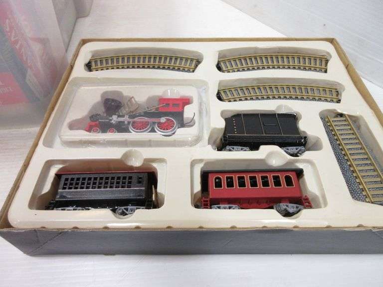 Clear Rubbermaid container, includes: (95) Misc. ornaments, animated ...