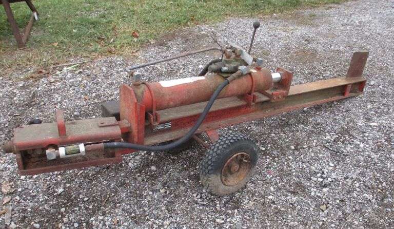 Antique log splitter, needs all new hoses, as is - Albrecht Auction Service