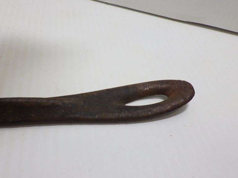 Cast iron kitchen tool, 10"L - Albrecht Auction Service