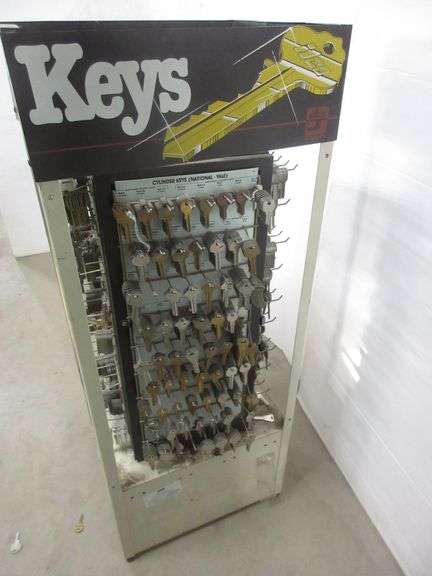 Older original storefront key display case with original key blanks ...