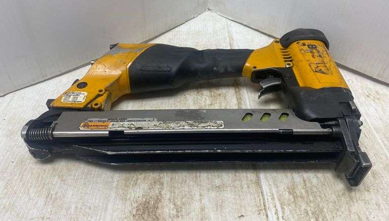 Bostitch 16-Gauge 1" x 1/2" to 2" staple gun with a strip of DeWALT 1 ...