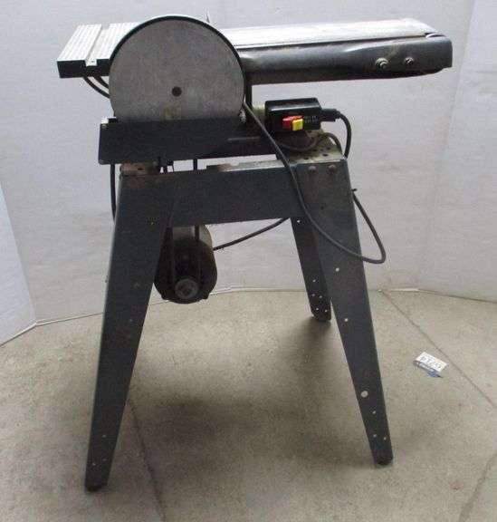 Craftsman 6" belt sander with a 9" disc sander on stand, 27"W x 23"D x ...