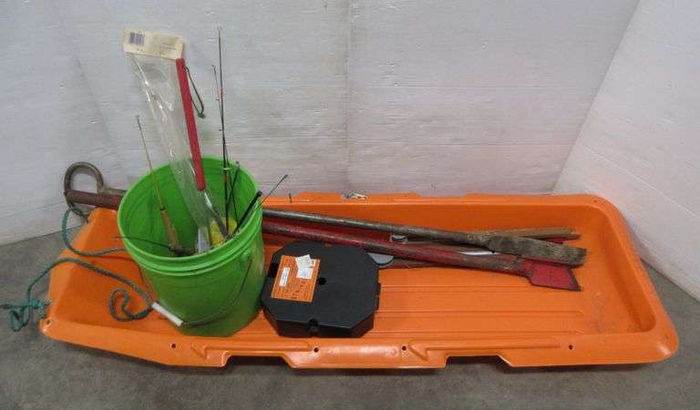 Ice fishing items, include: 5' Toboggan, (2) Ice chisels, (2) Tip-ups ...
