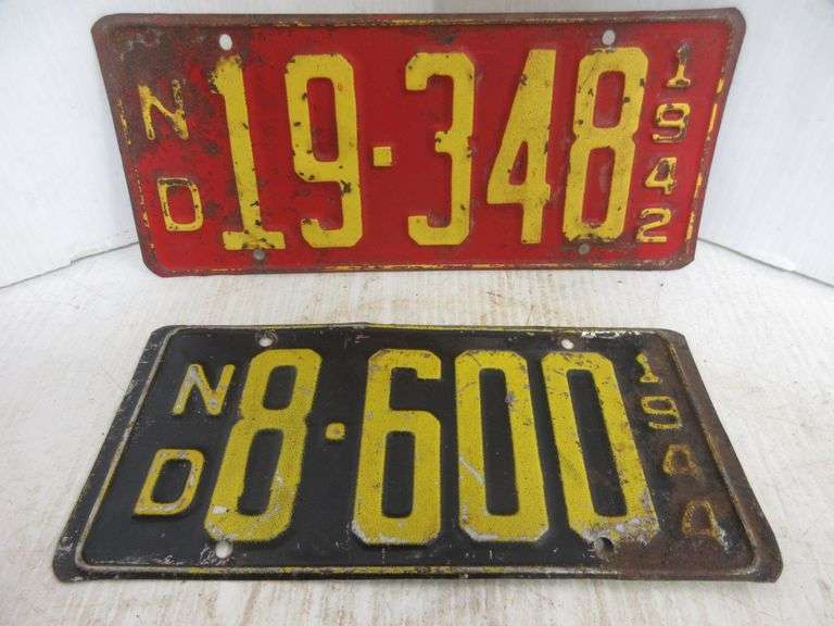 (2) North Dakota license plates, 1942 and 1944, WWII era, both are 12"W ...